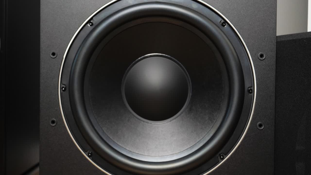 Motion controlled close-up shot of a bass reflex box Premium Stock ...