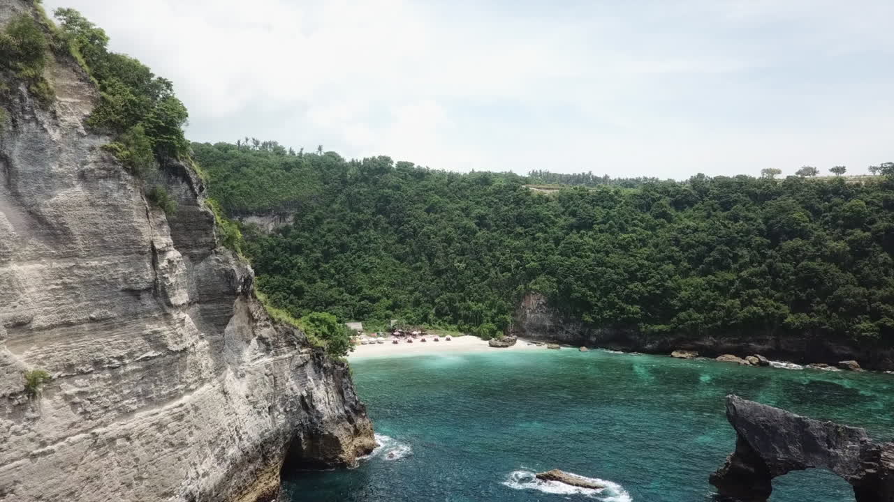Cliff Aerial Reveals Tourism Huts On Atuh Beach Free Stock Video ...
