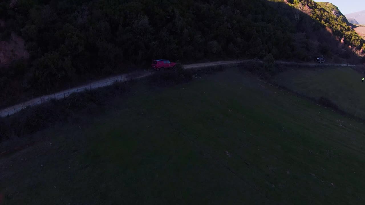 Red Rally Car Driving Fast Through Muddy Off Road Track Free Stock ...