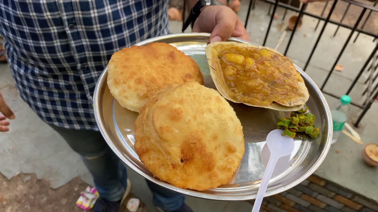 Premium stock video - Club kochuri, kachori of kachauri is a spicy ...