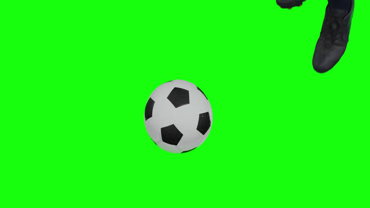 Video Of Caucasian Male Soccer Player Kicking Ball On Green Screen ...