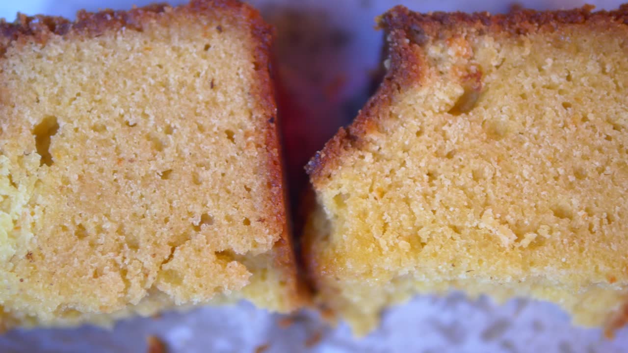Close up of delicious golden brown cake Premium Stock Video Footage
