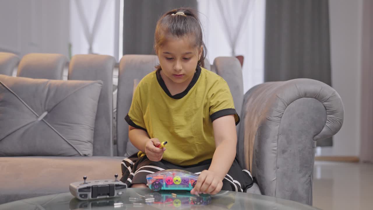 Indian Kid Fixing A Robotic Electrical Car Using Screwdriver Free Stock ...