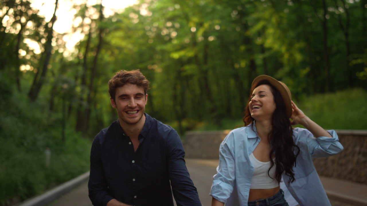 Free stock video - Love couple having fun at romantic date at sunset