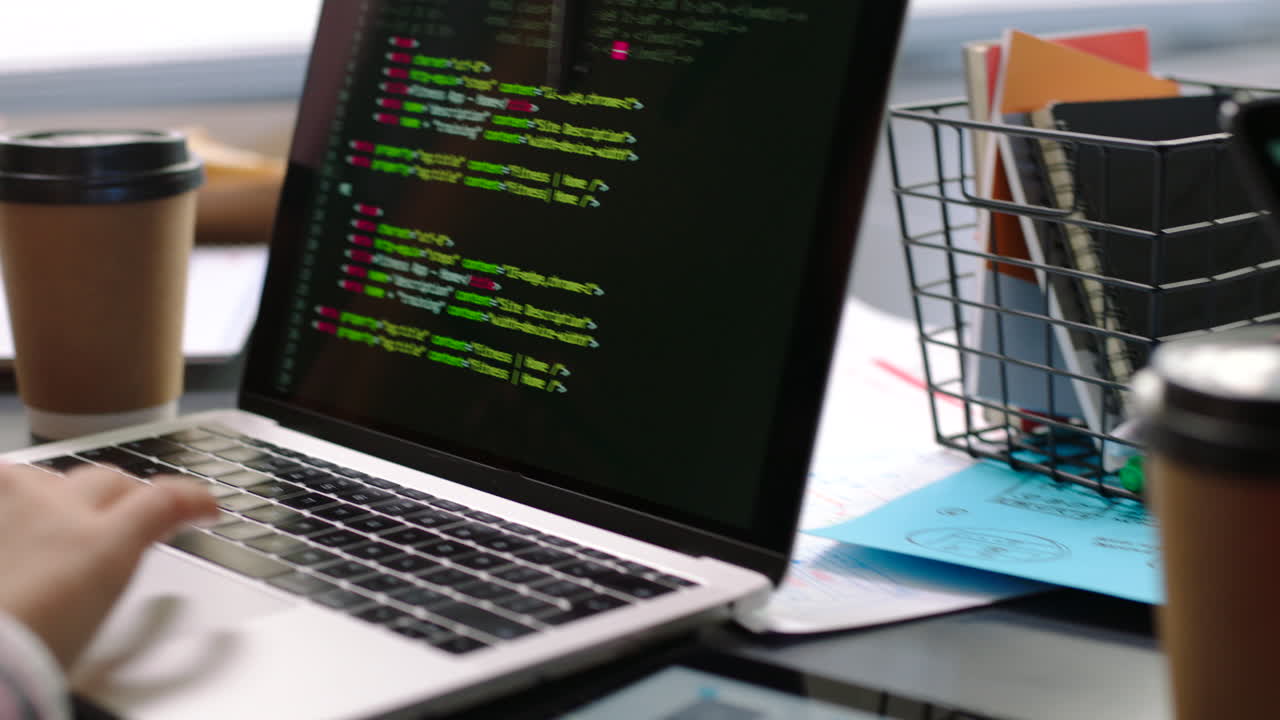 Premium stock video - Laptop, programming and hands of digital