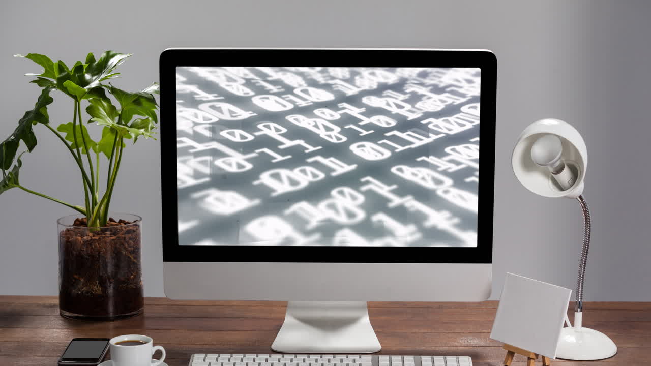 Animation of computer with data processing on screen on desk in office ...