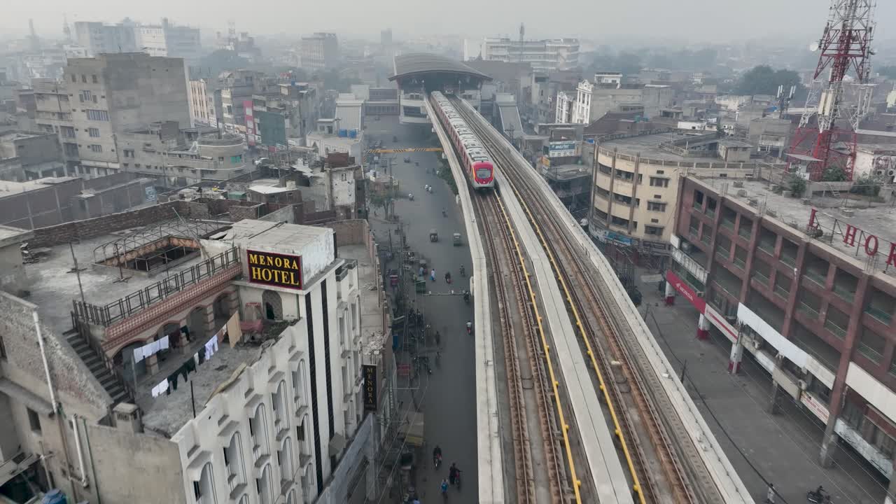 Aerial View Of Orange Line Metro Train Approaching Station Near McLeod ...