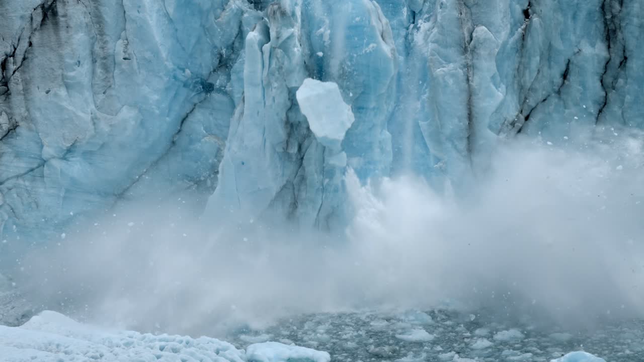 Premium stock video - Telephoto slow-motion footage of big ice column ...