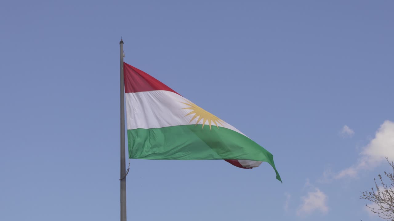 Premium stock video - An iraqi flag blowing and waving in the wind ...