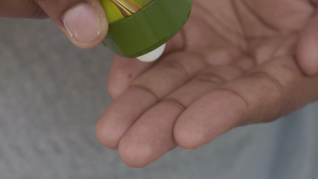 Applying Hand Lotion | Premium Stock Video Footage