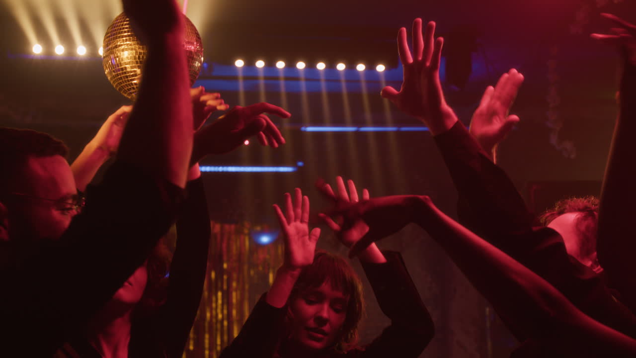 People Dancing Under a Disco Ball at a Party | Free Stock Video Footage
