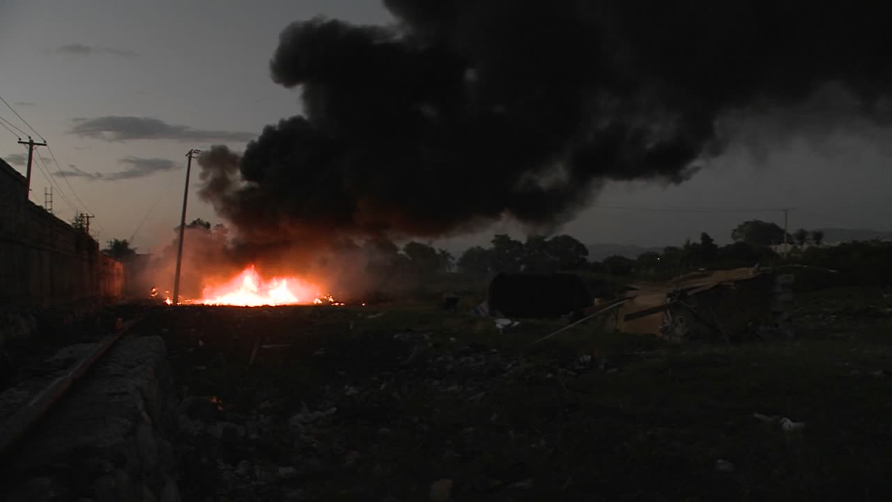 A Large Fire Burns In The Distance Free Stock Video Footage Download ...
