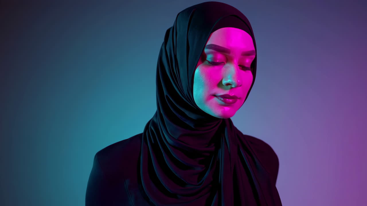 Woman in Hijab, Neon Lighting Portrait | Premium Stock Video Footage