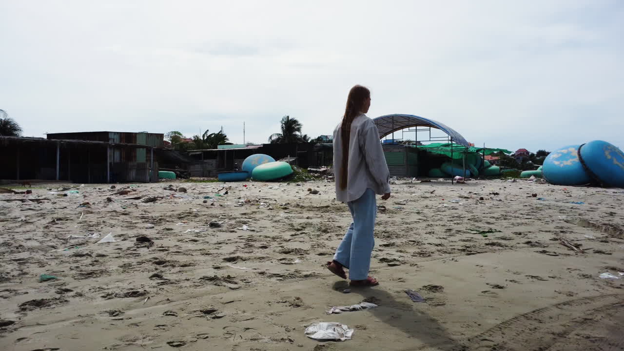 European Girl Walking On The Mui Ne Beach With Round Boats In The Shore ...