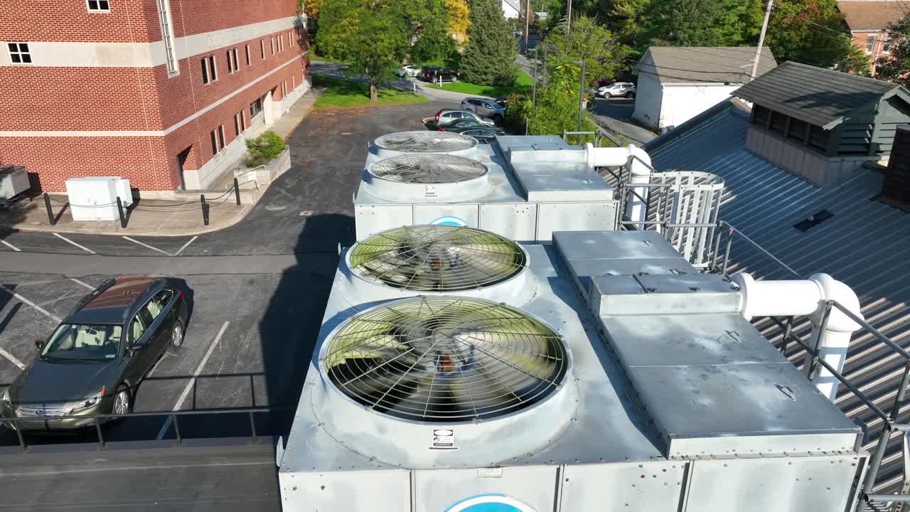 Premium stock video - Air conditioner condenser units on rooftop
