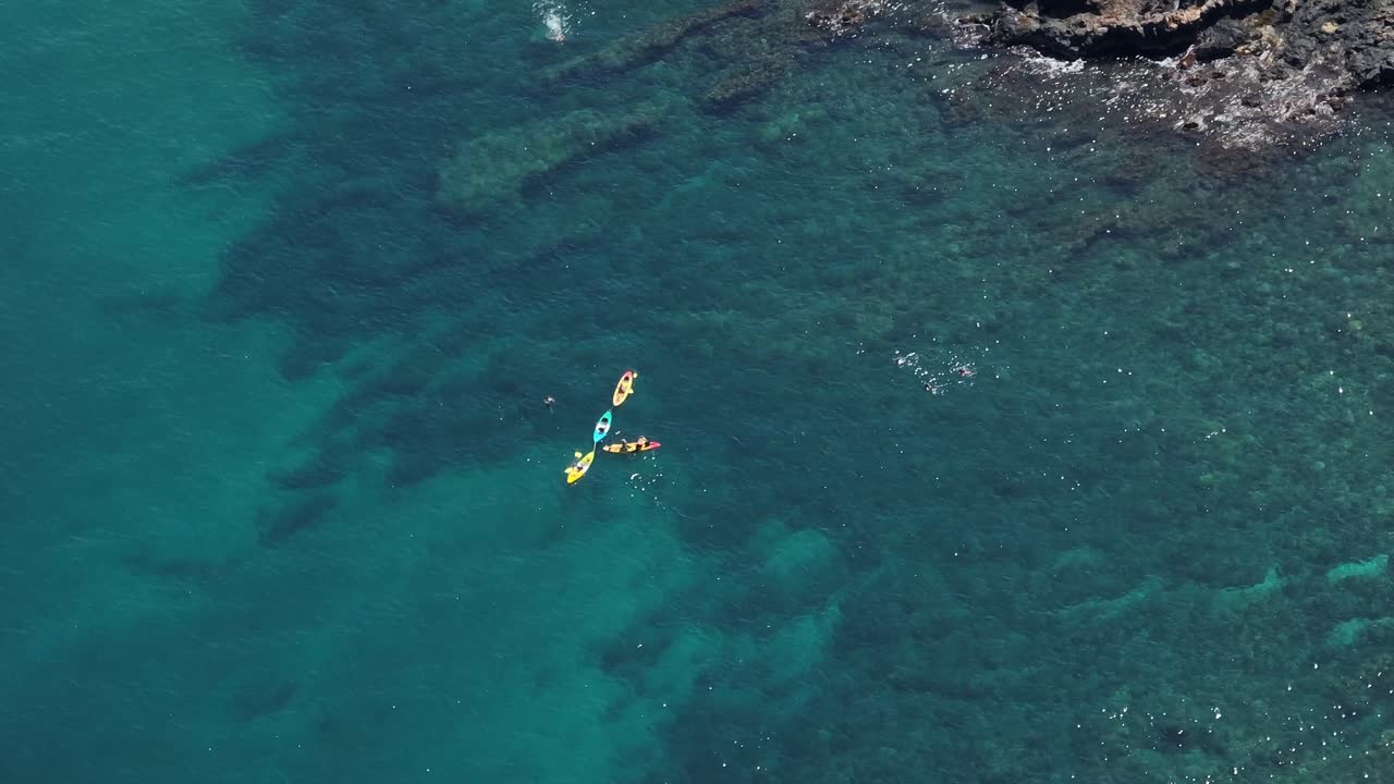 Premium stock video - Molokini crater water activities; kayaking tours ...