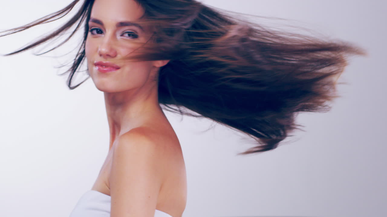 Premium stock video - She has perfected the hair flick