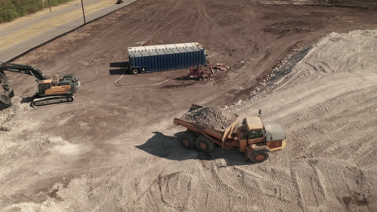 Bird's Eye View Of A Construction Site With A Full Dump Truck With A ...