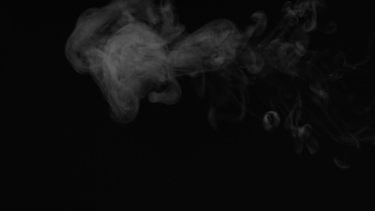 Premium stock video - Single strong puff of smoke for overlay