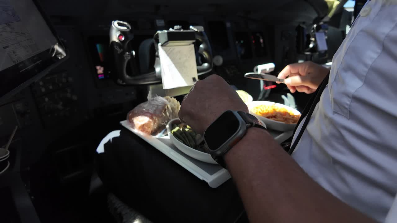 Premium stock video - Arm and hand of a white pilot inside a jet ...