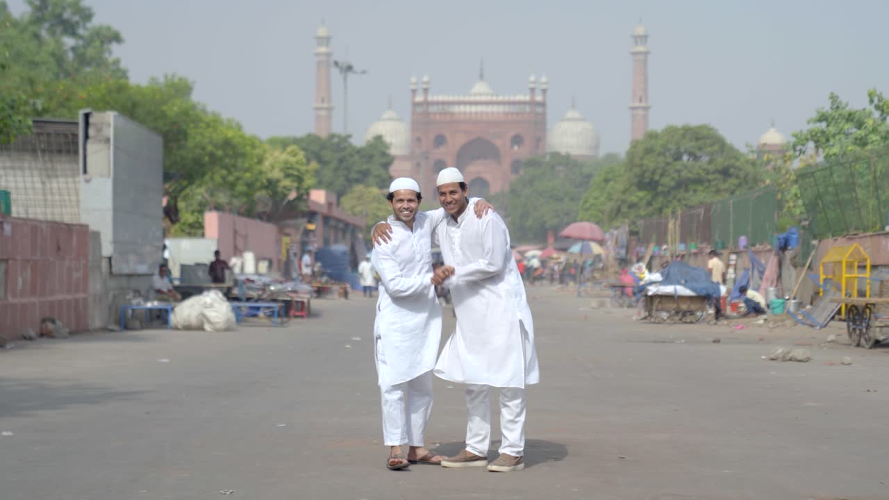 Indian Muslims Greeting And Hugging Each Other At A Mosque Free Stock ...