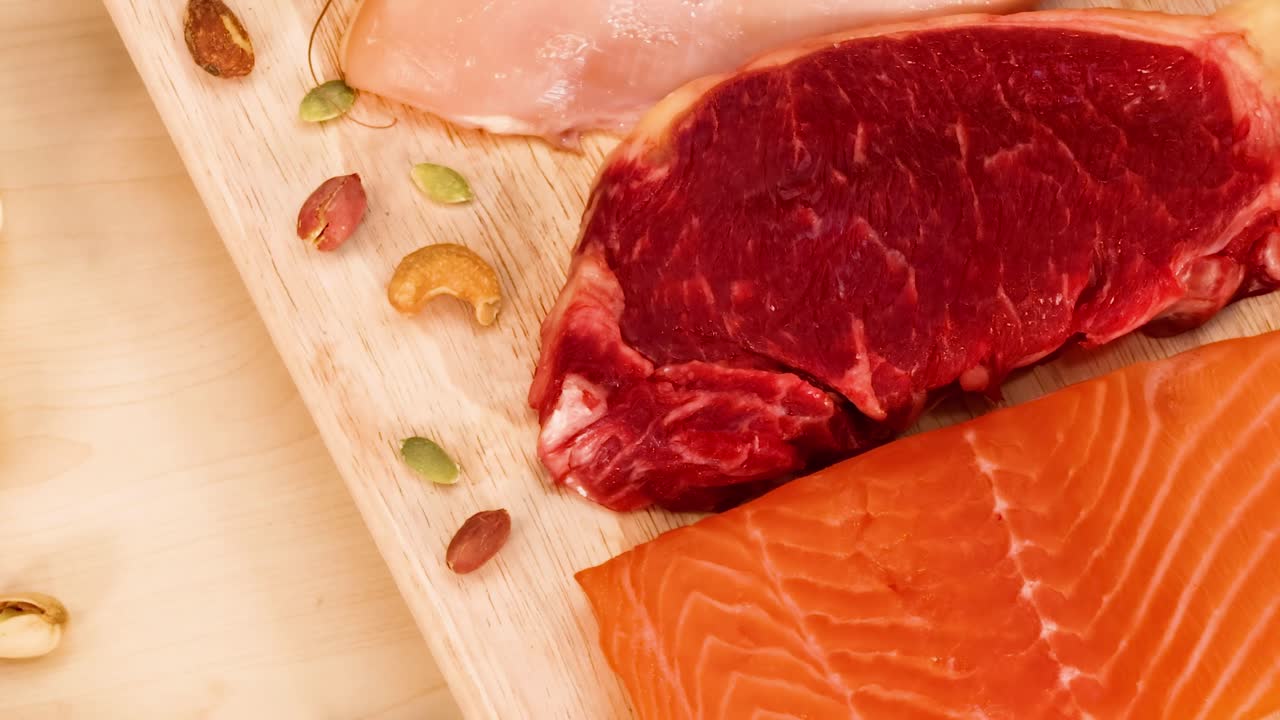 Variety of meats, nuts, and eggs on display | Premium Stock Video Footage
