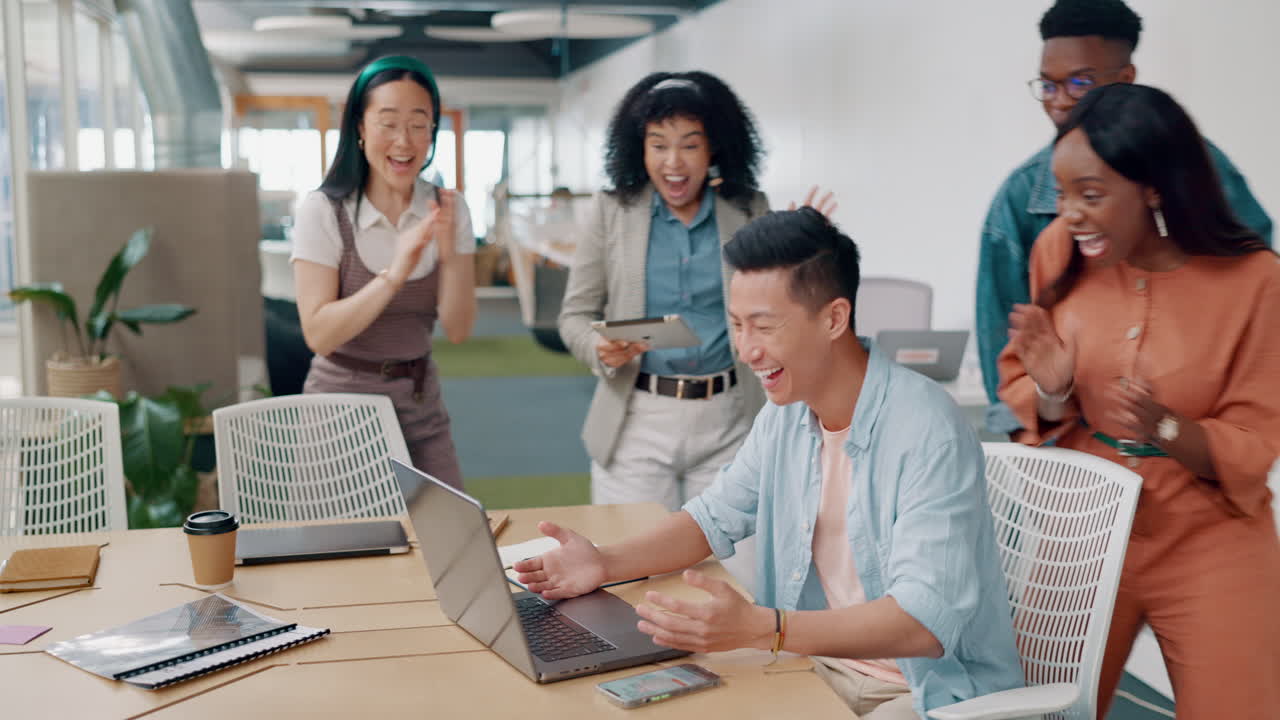 Premium stock video - Winner, yes and applause with a business asian man