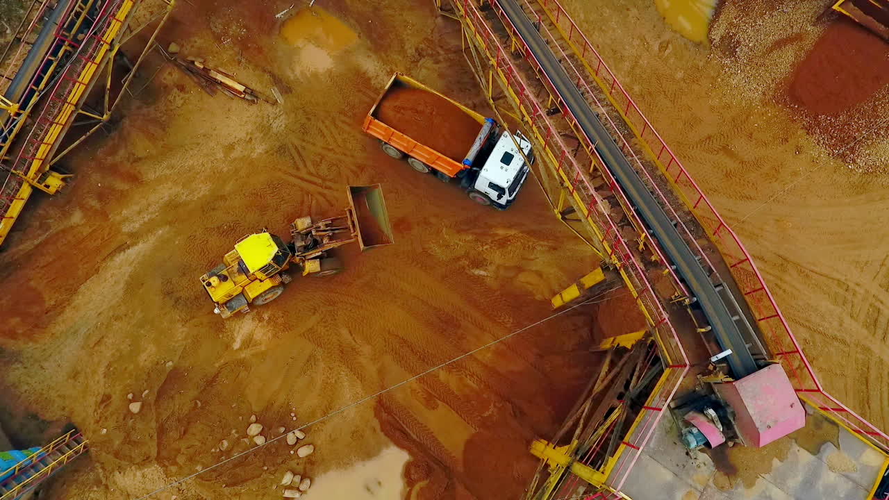 Excavator Loader Load Sand In Dumper Truck. Aerial View. Sand Work Free ...