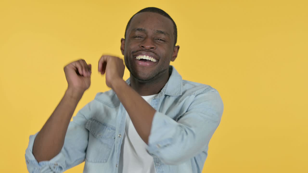 Positive Young African Man Clapping, Yellow Background | Premium Stock ...