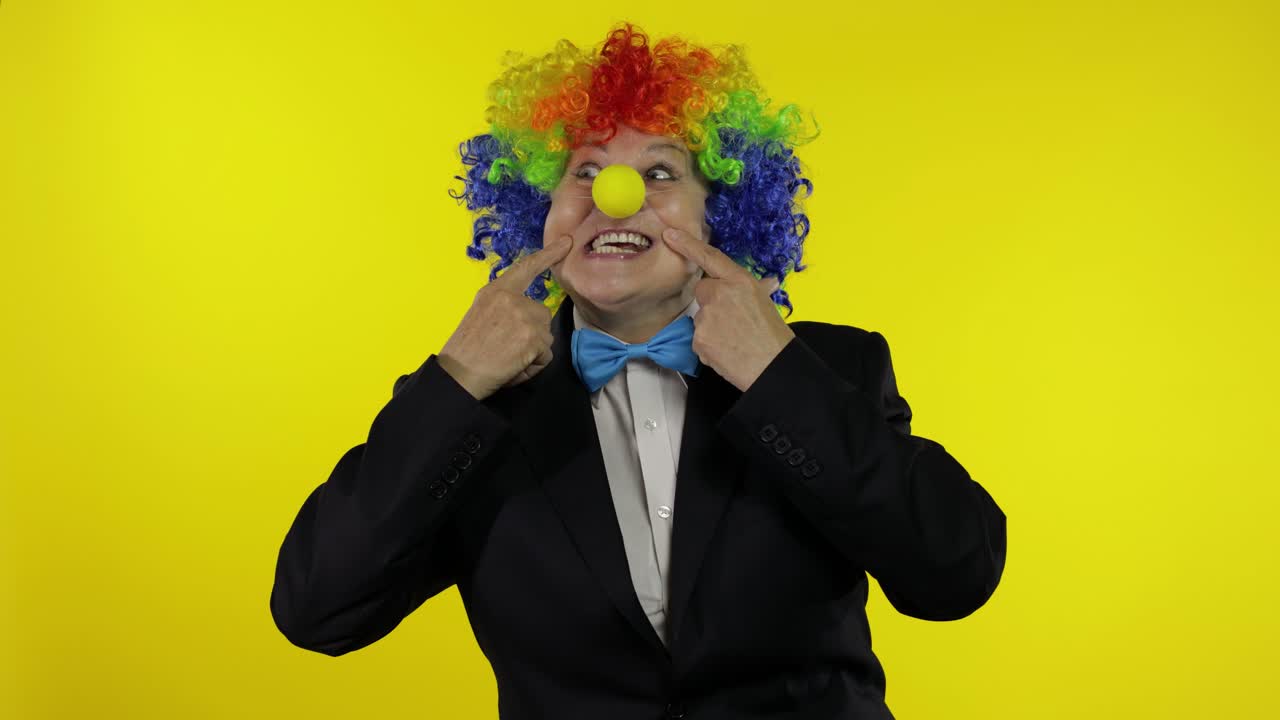 Senior Old Woman Clown In Wig Having Fun, Smiling, Dancing, Making Silly Faces Free Stock Video ...