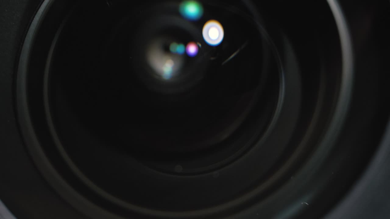 Camera lens aperture close-up. Aperture blades opening and closing ...