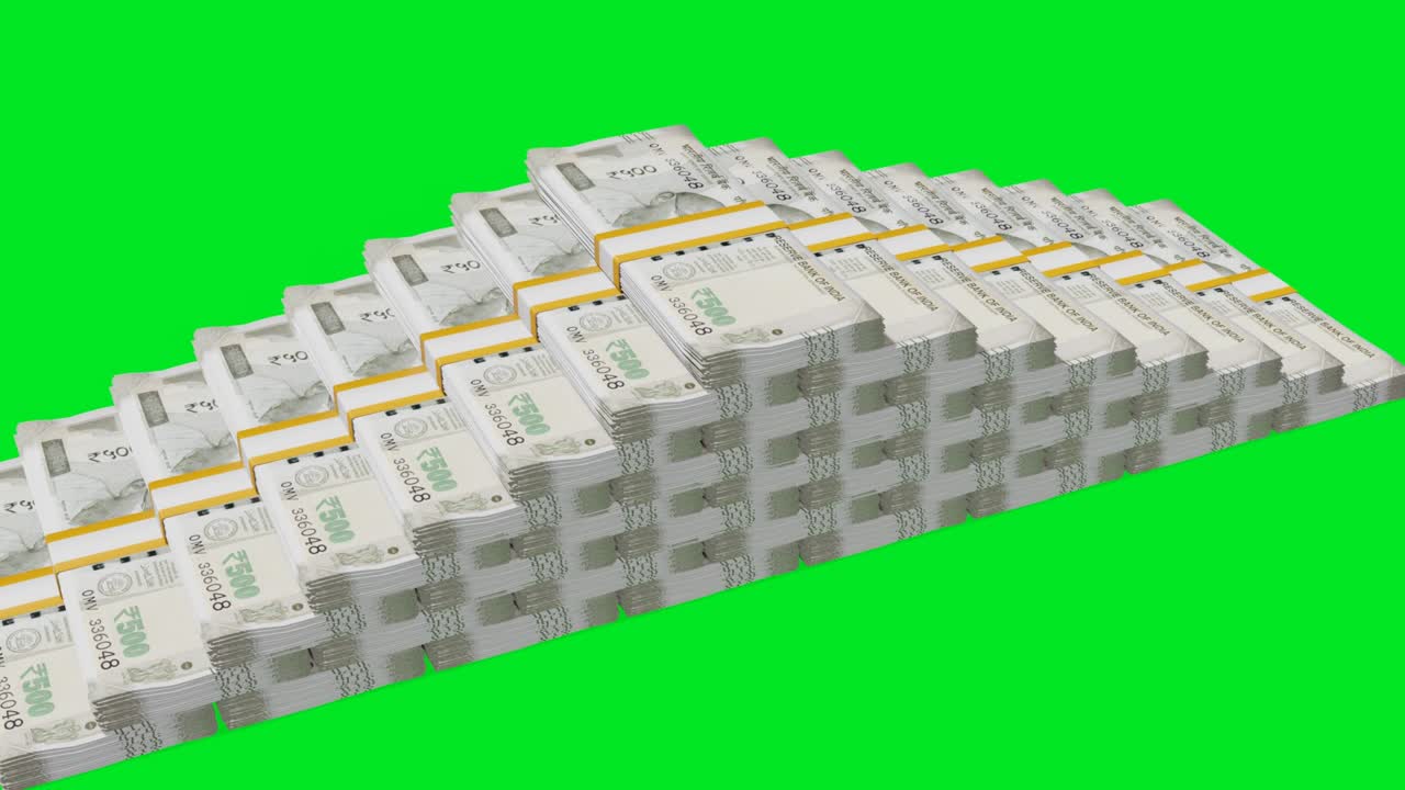 Many wads of money on chromakey background. 500 Indian Rupees banknotes ...