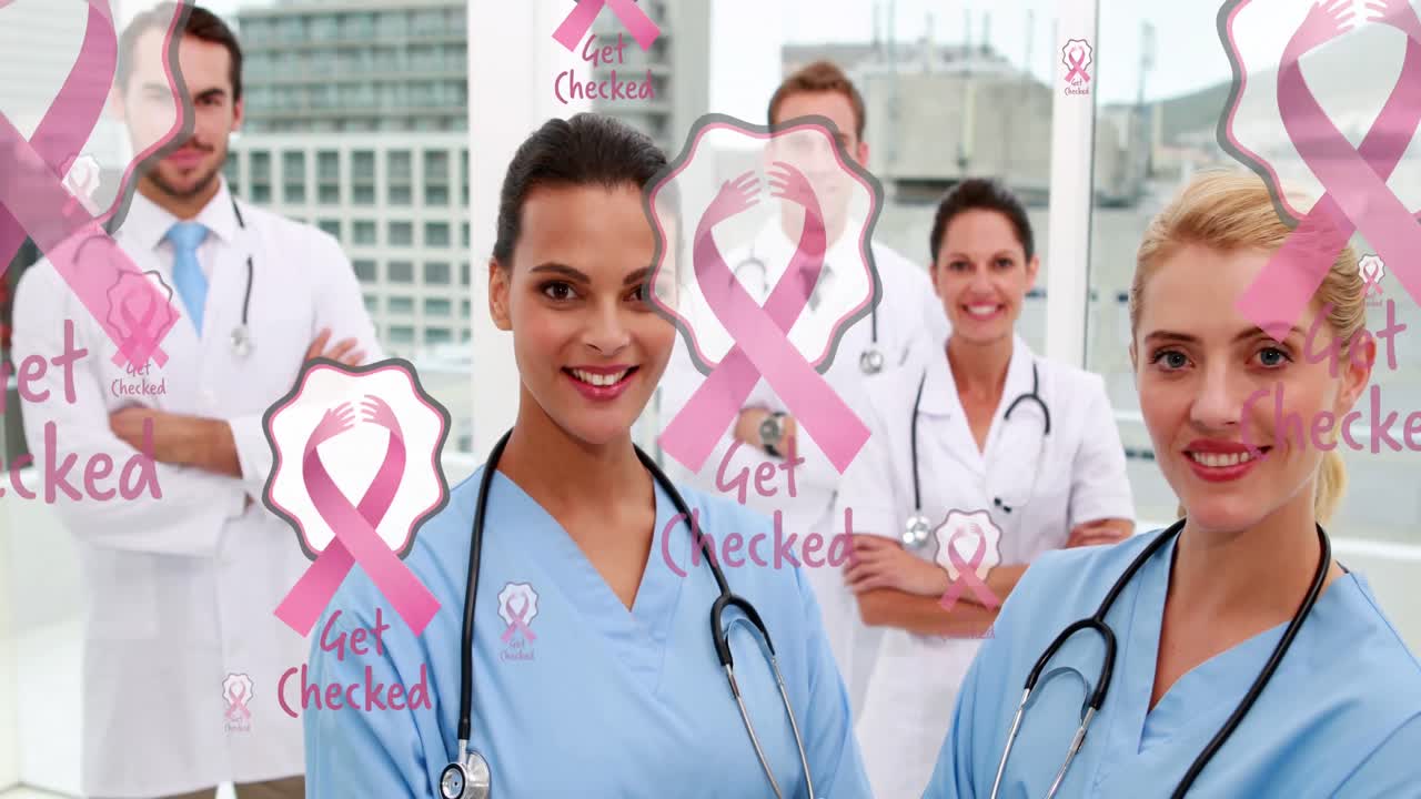 Animation Of Pink Ribbon Cancer Logos, Floating Over Smiling Group Of ...