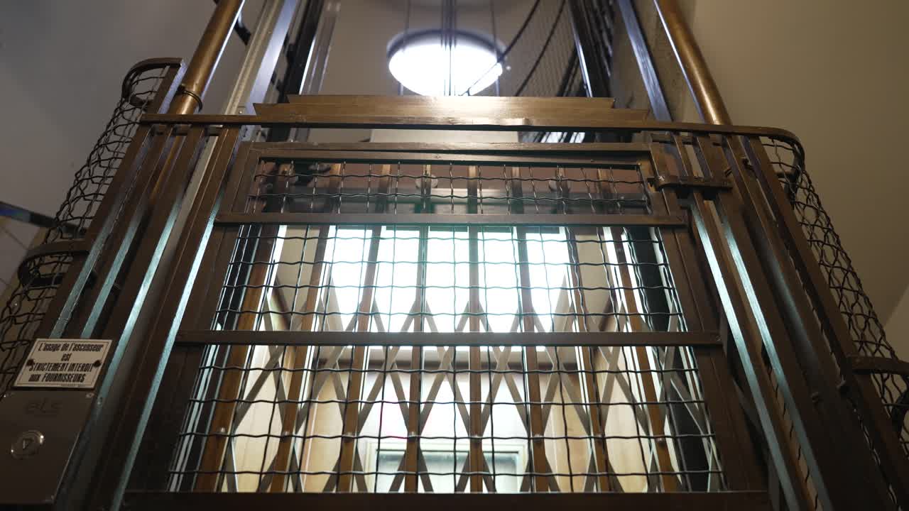 Premium stock video - Empty old elevator descending and passing by at ...