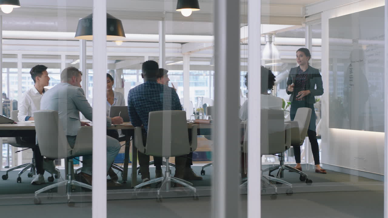 Premium stock video - Group of business people meeting in boardroom ...