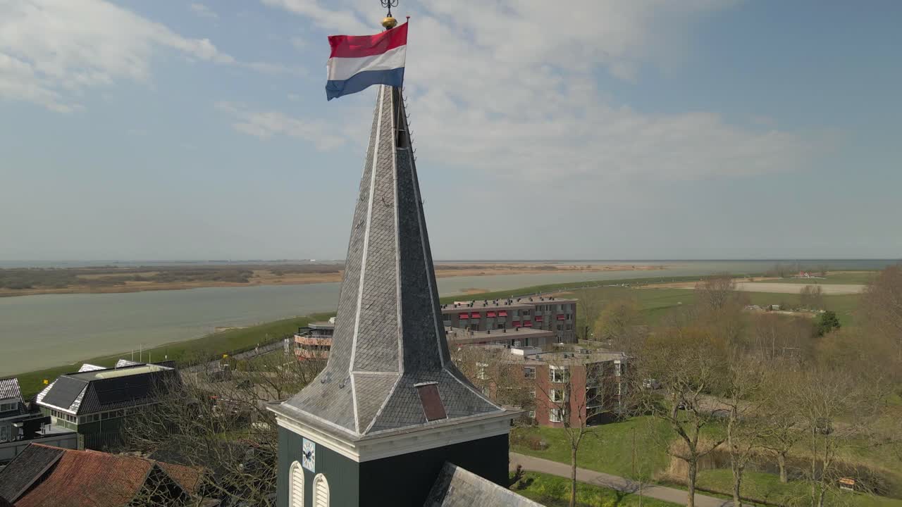 Premium stock video - Flying past donia church in makkum with golden ...