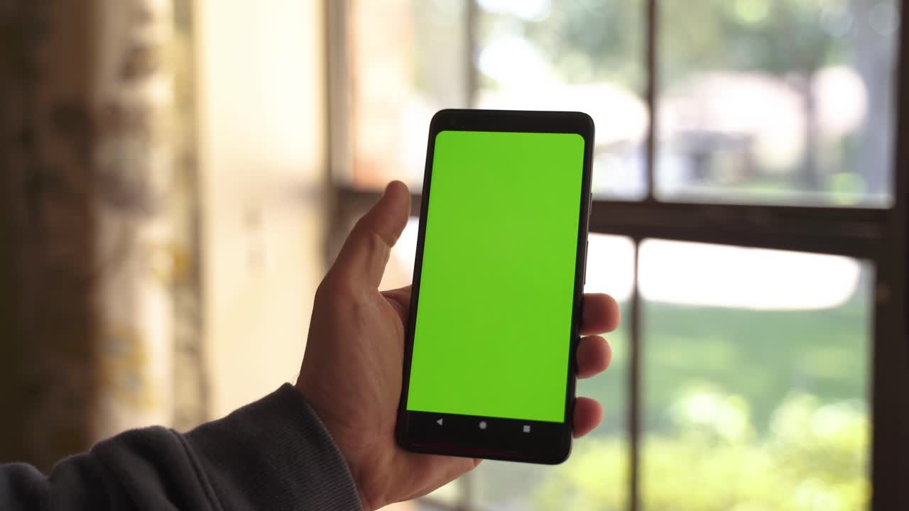 Premium stock video - Male hand swiping cell phone screen and clicking ...