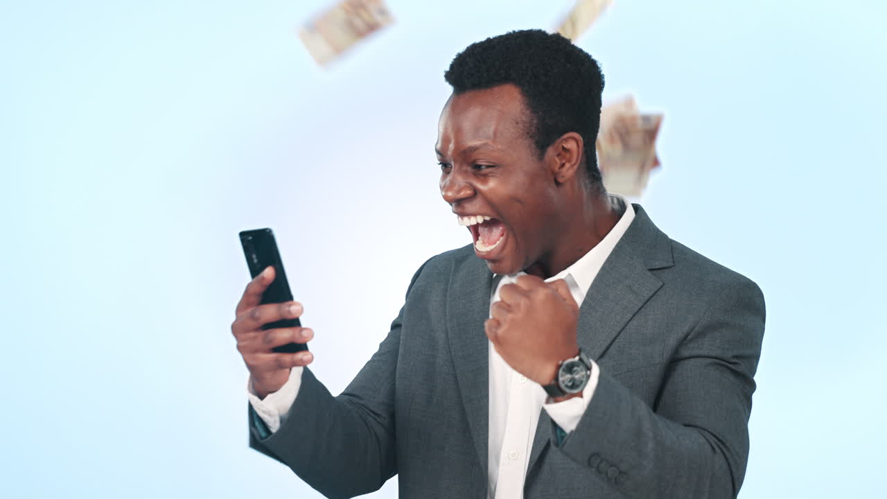Premium stock video - Phone, money and black man in a studio