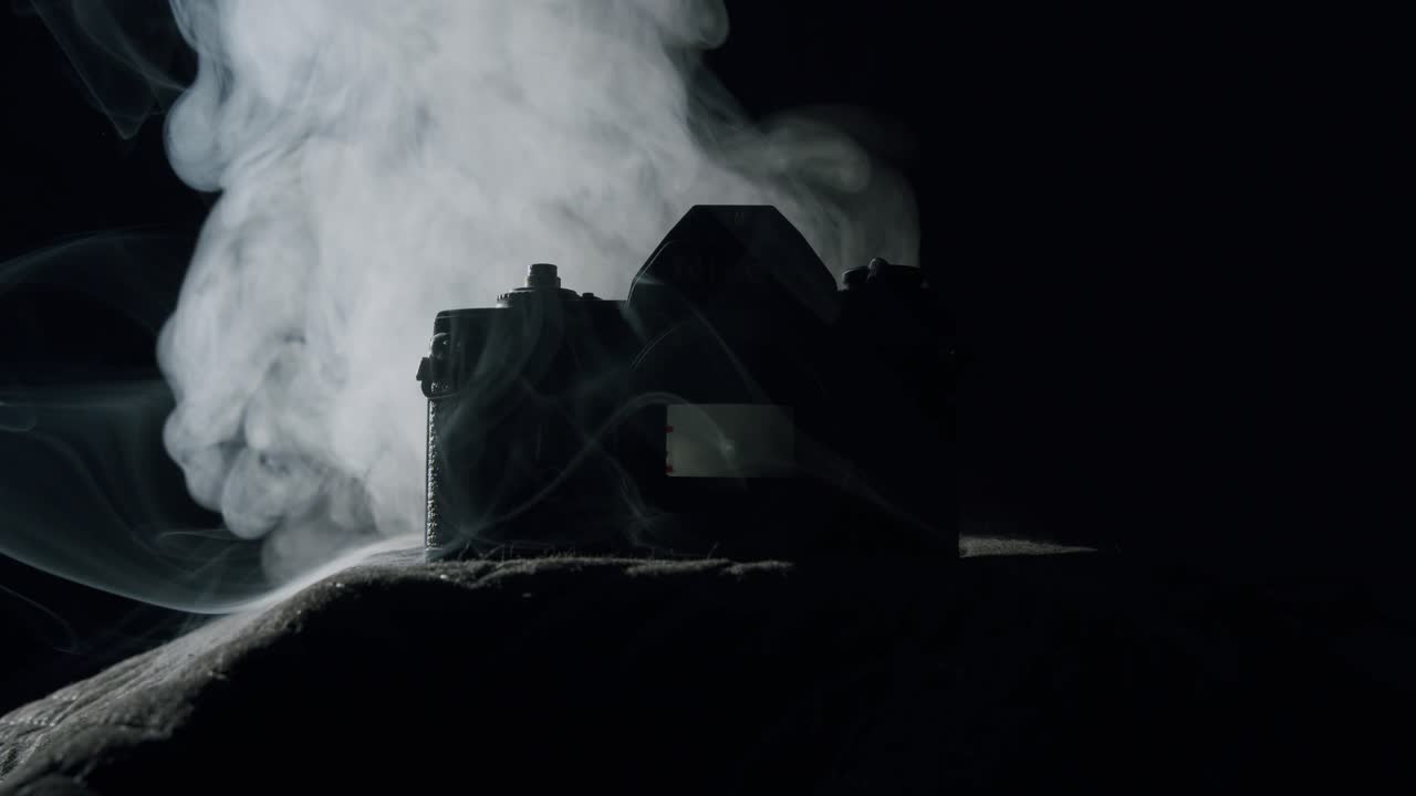 White smoke on a vintage reflex camera with no lens - 03 Premium Stock ...