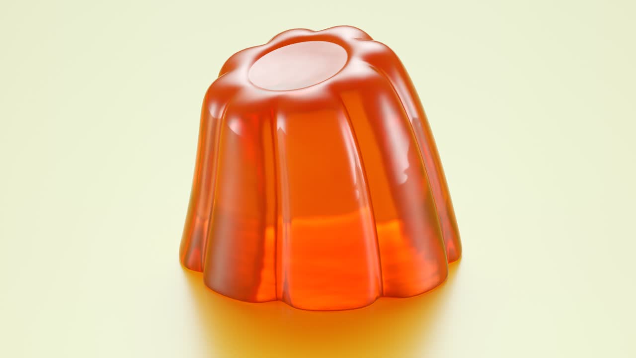 Premium stock video - Wobbly single orange jelly isolated on white ...