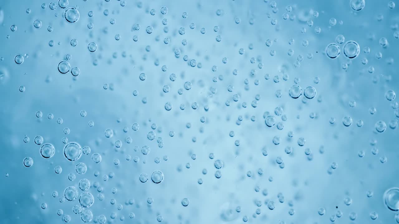 Premium stock video - Oxygen bubbles in water on a blue abstract ...