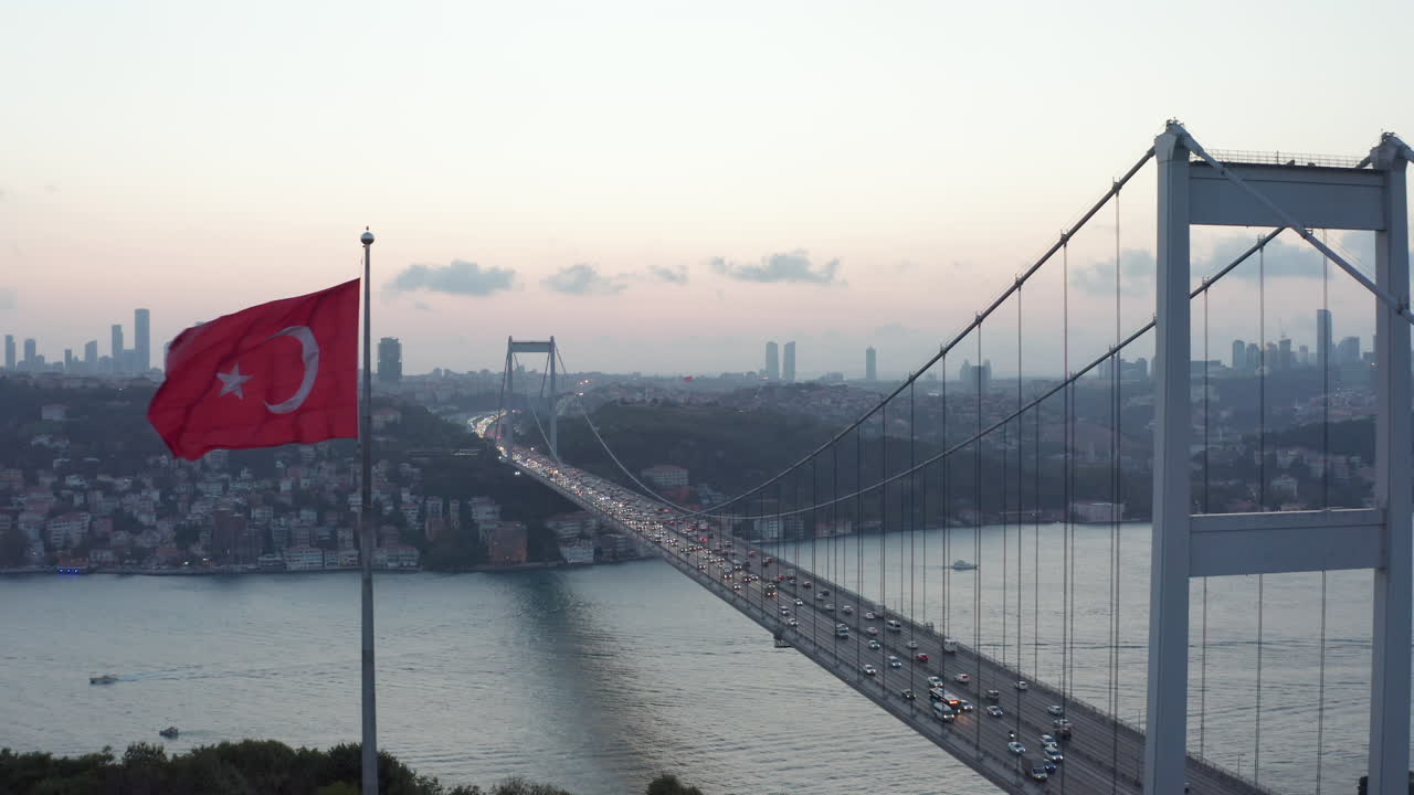 Dolly Forward Past Waving Turkish Flag Revealing Bosphorus Bridge ...