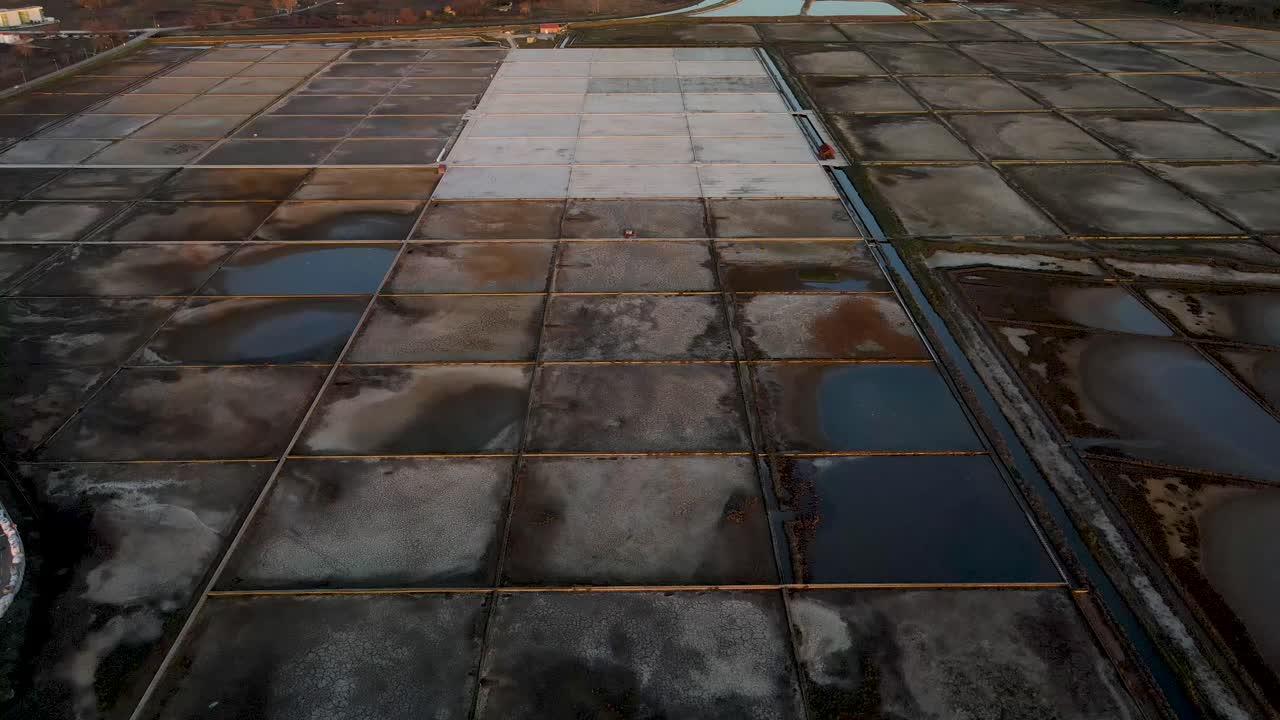 Reverse Drone Flight Next To A Salt Field In Croatia In Nin At Twilight ...