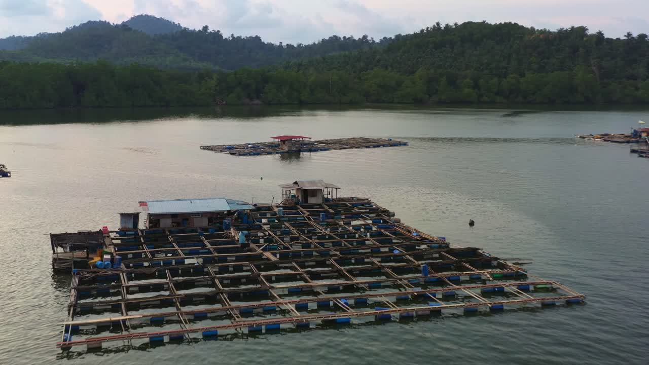 Aquaculture fish farms on calm waters, breeding, rearing, and ...