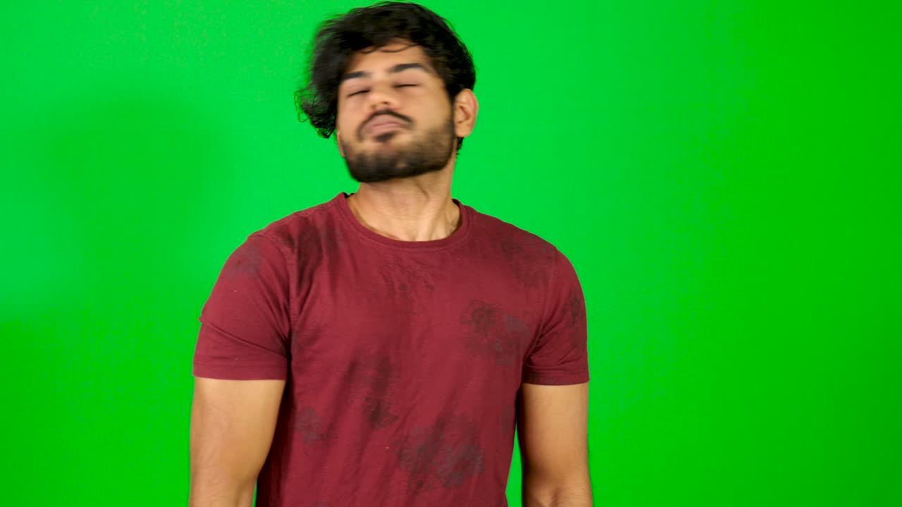 Premium stock video - Indian man shy with green background indian green ...