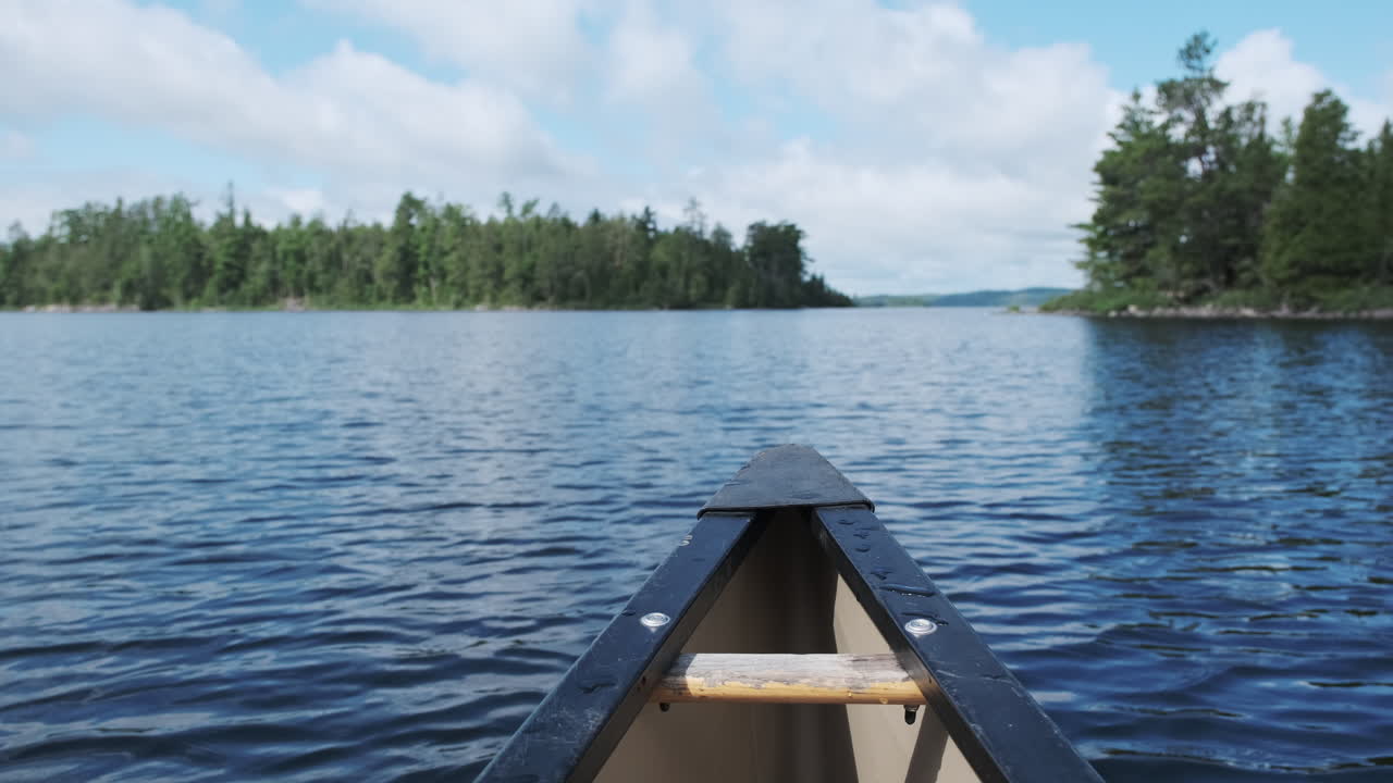 Premium stock video - Pov from canoe bow on a sunny day in the boundary ...