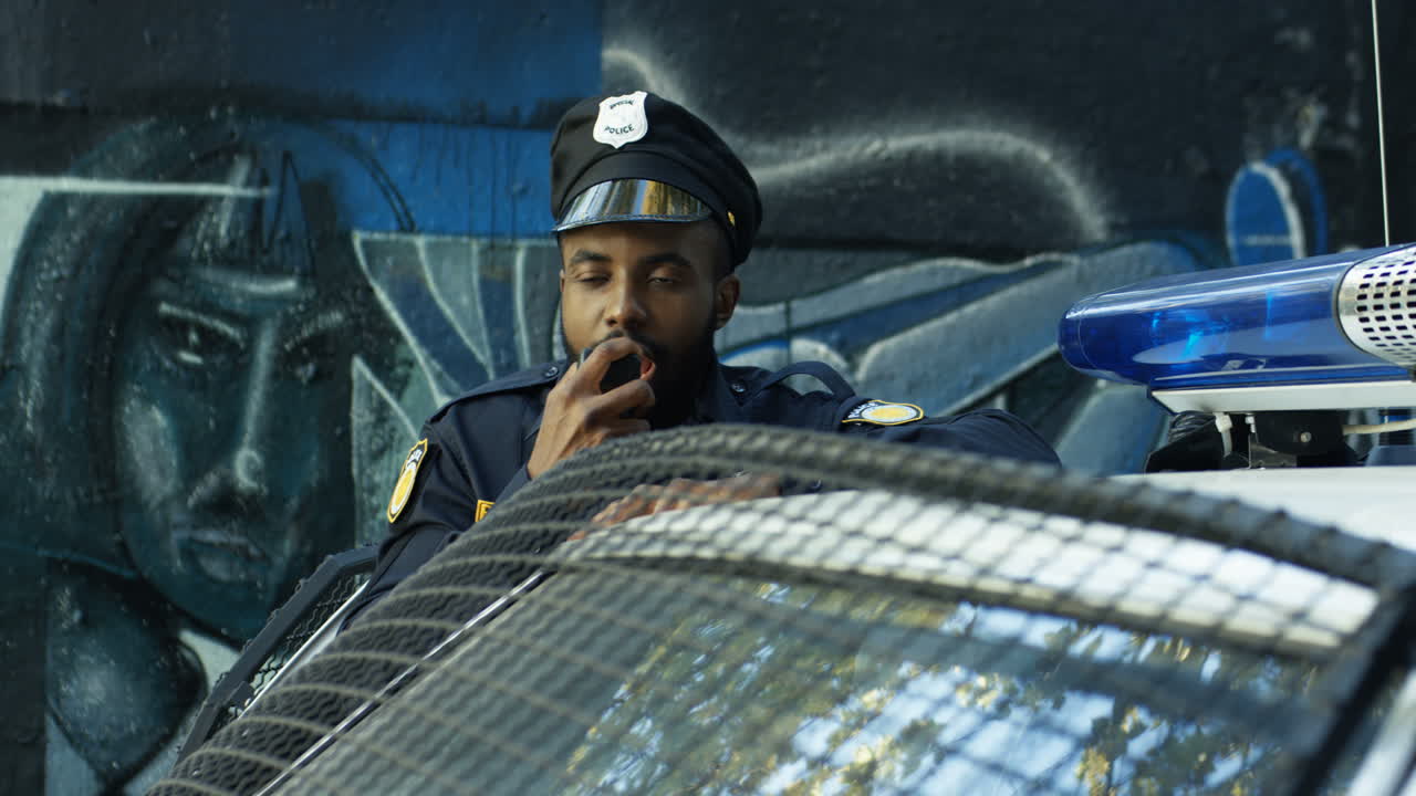 Free stock video - Young handsome police officer talking and screaming ...