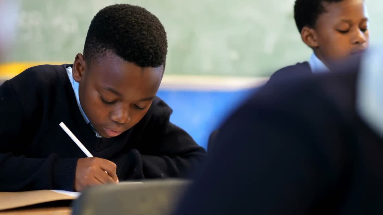 Schoolkids studying in the classroom 4k Premium Stock Video Footage