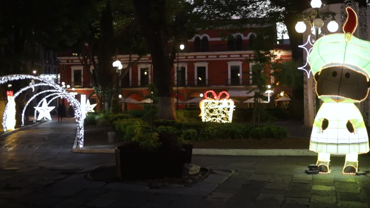 Premium stock video - Pan footage of christmas lights and decorations ...