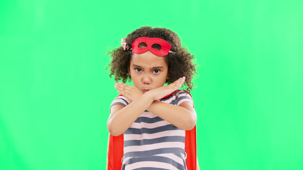 Premium stock video - Superhero, child and stop sign on green screen